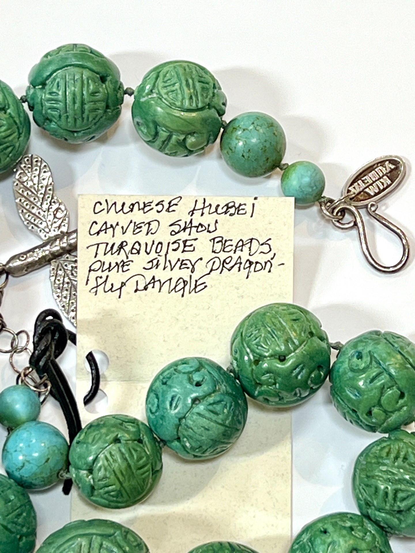 Carved turquoise beads store